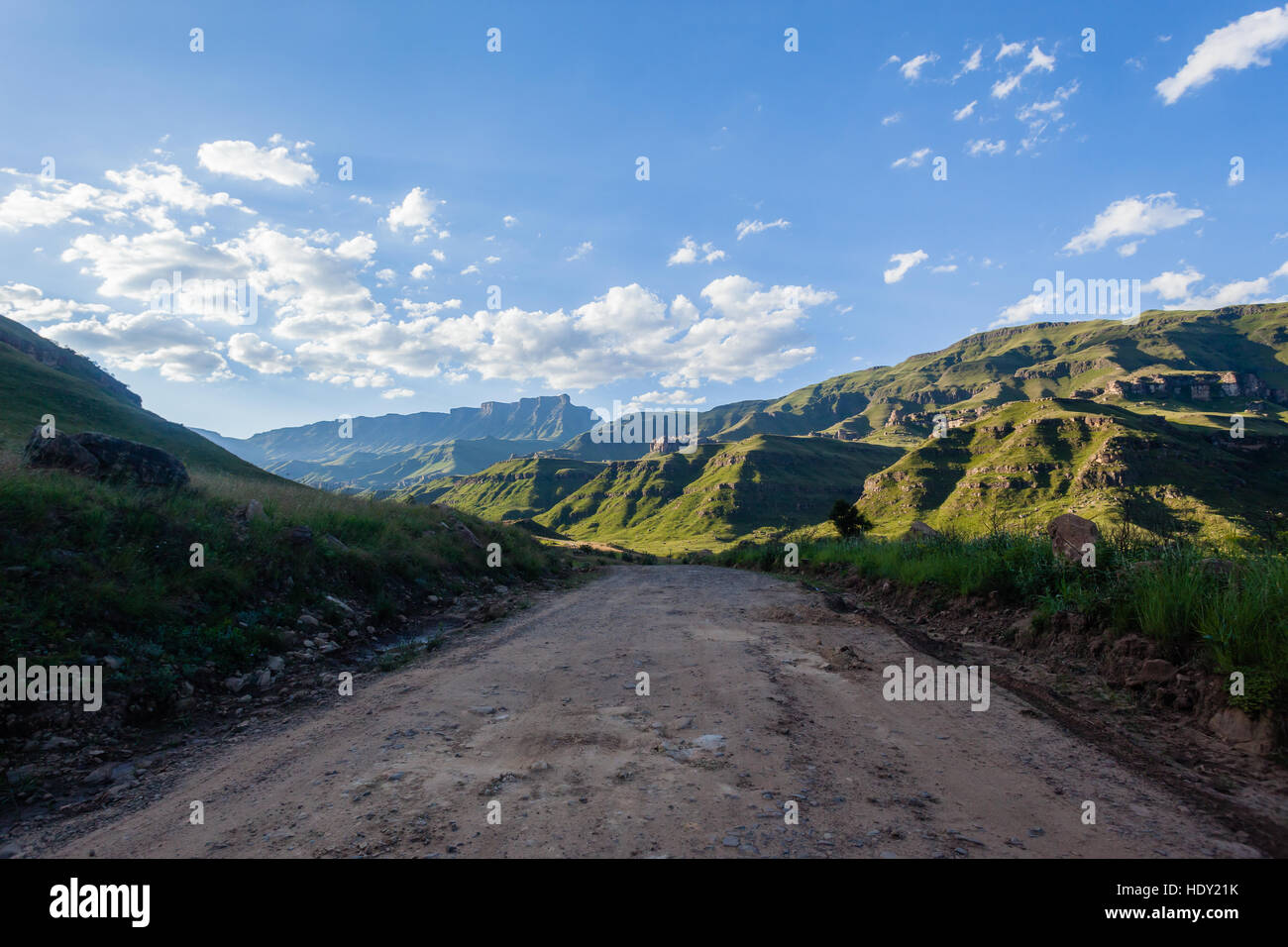 Dirt road rugged route through scenic rural mountains valley pass to ...