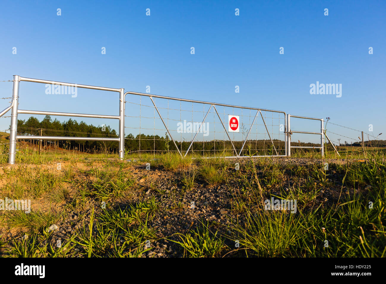 Mountains rural farm gate entrance Stock Photo - Alamy
