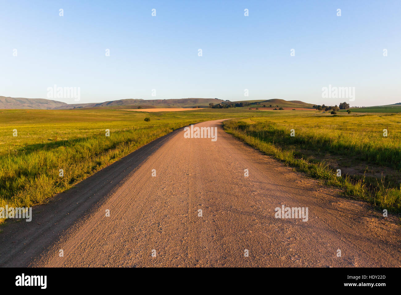 Mountains rural dirt road route photo through farmlands landscape Stock ...