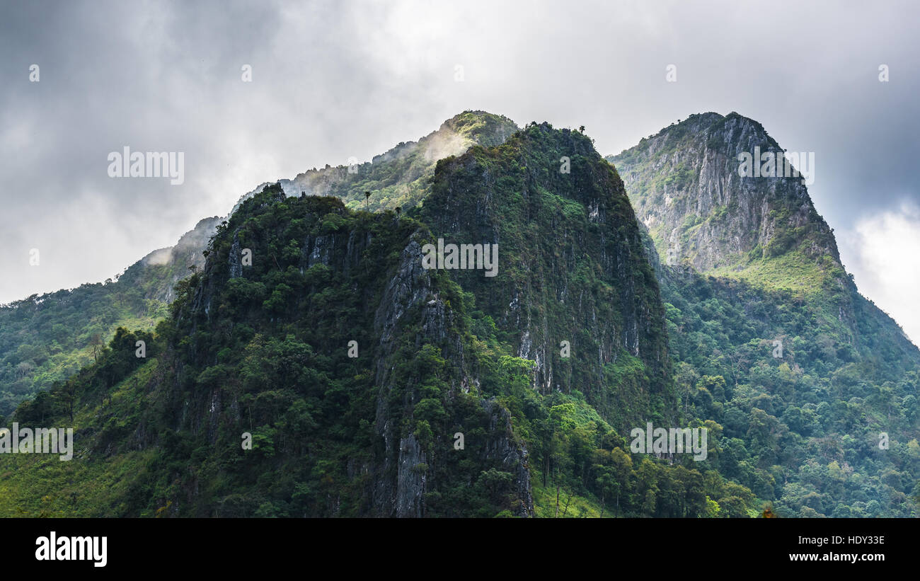 High mountain ridge in thick fog Stock Photo - Alamy