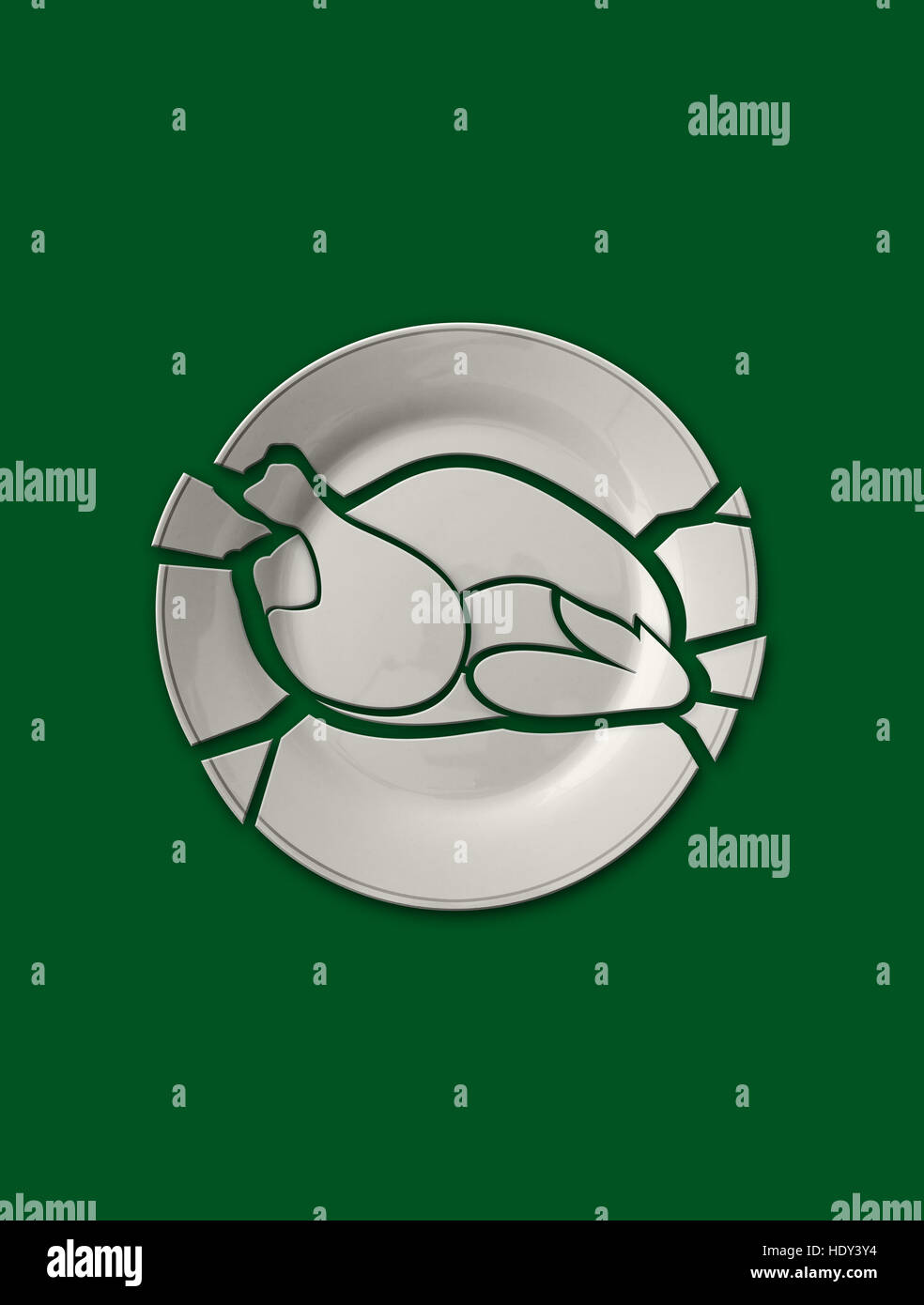 Isolated broken plate in the shape of chicken meat on solid green color ...