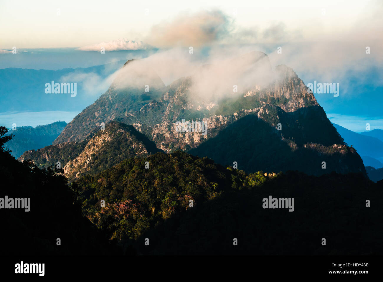 High mountain ridge in thick fog Stock Photo - Alamy