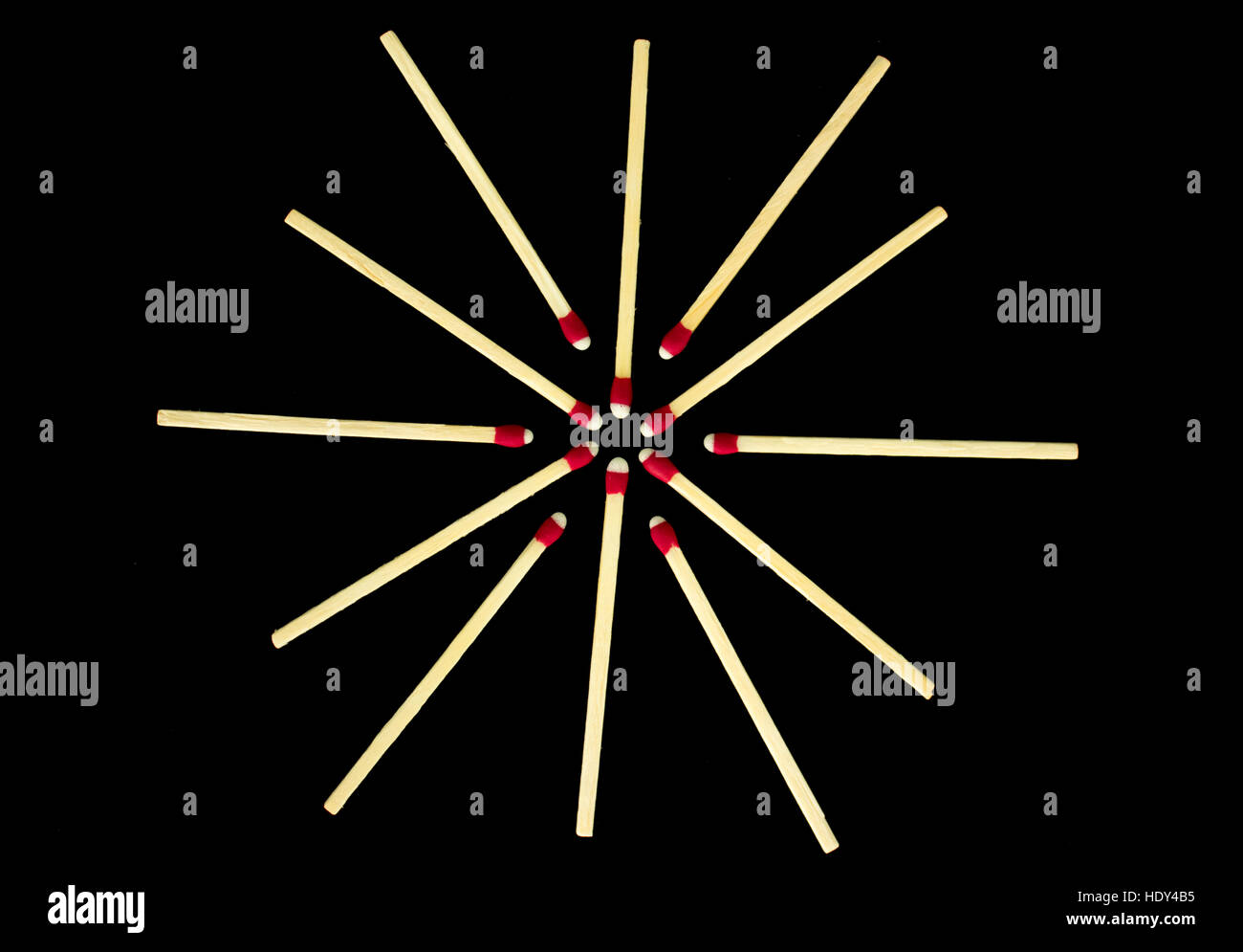 A simple star design with strike-anywhere matches, isolated on a black ...
