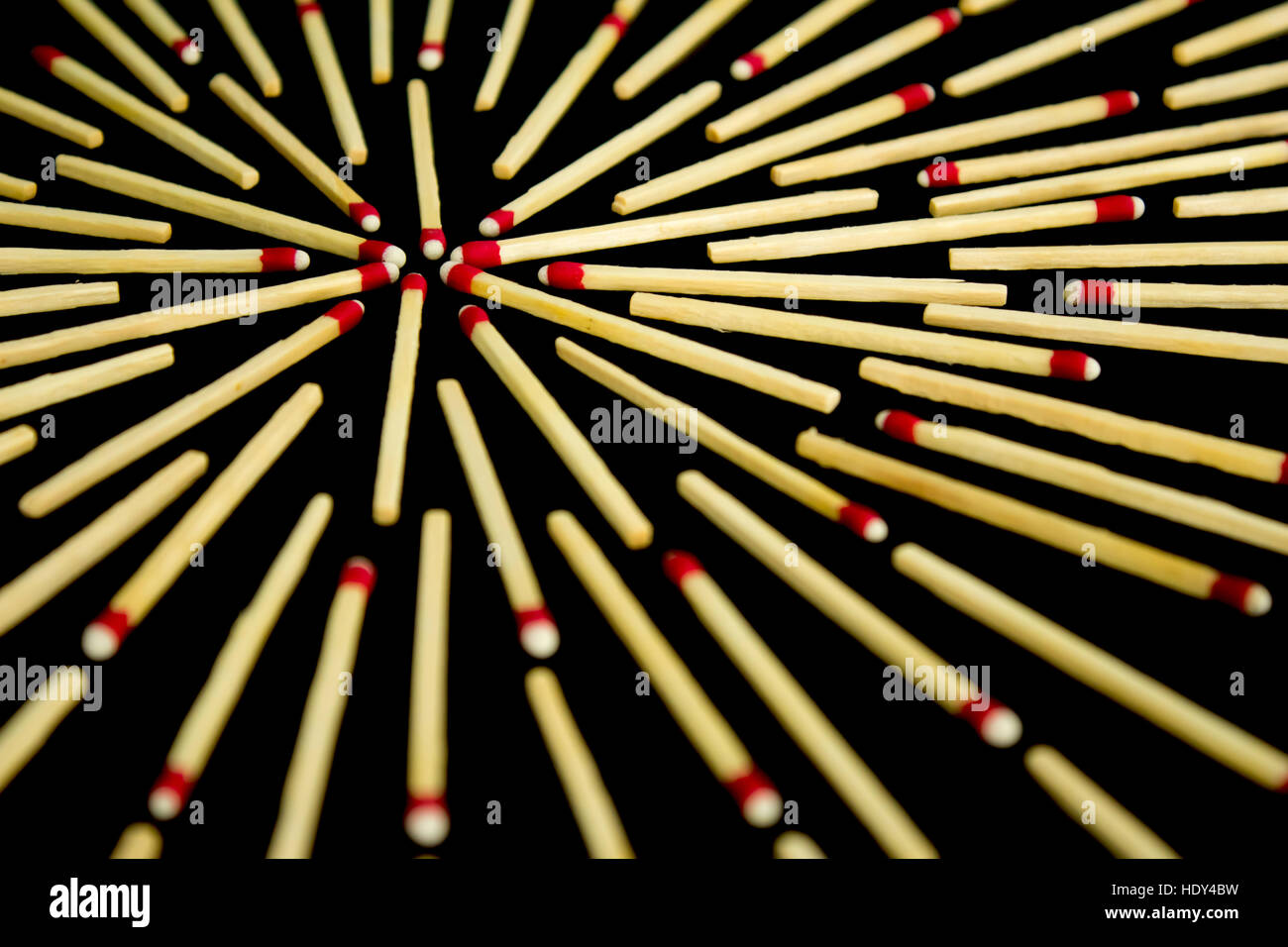 A complex star design with strike-anywhere matches, isolated on a black ...