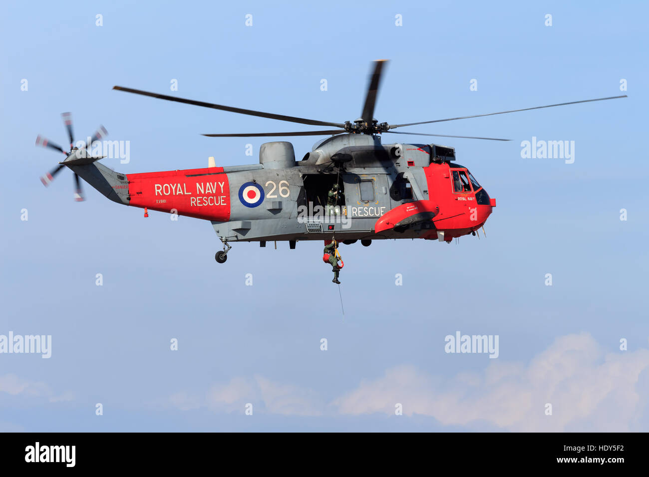 Royal Navy Seaking Search and Rescue helicopter performing mock rescue ...