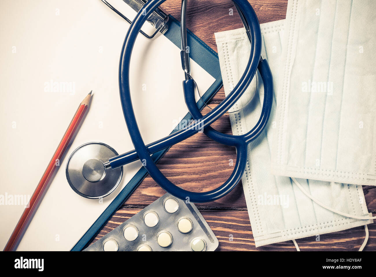 Desk of doctor with medicine things Stock Photo - Alamy