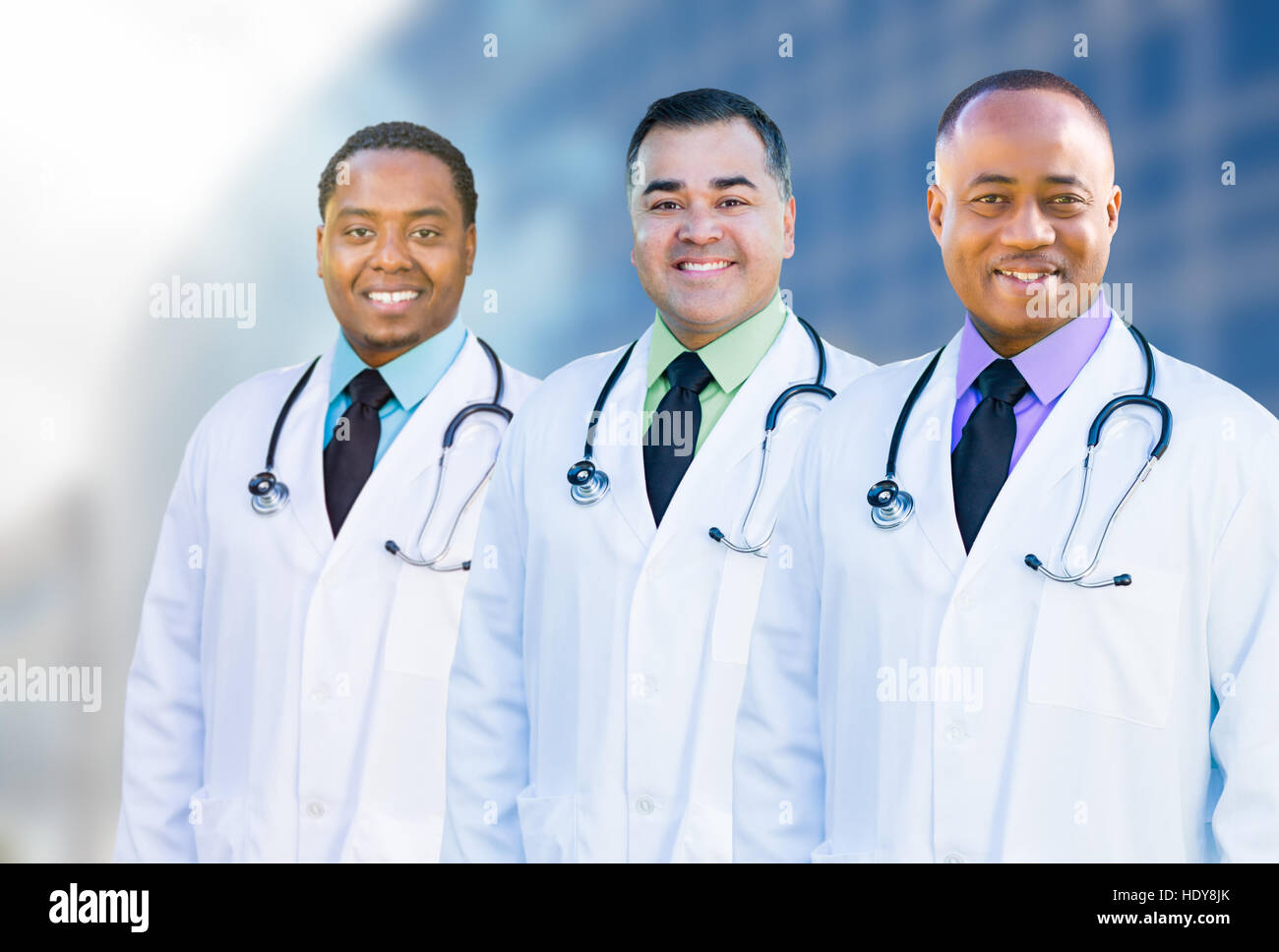 Handsome African American and Hispanic Male Doctors Outside of Hospital ...
