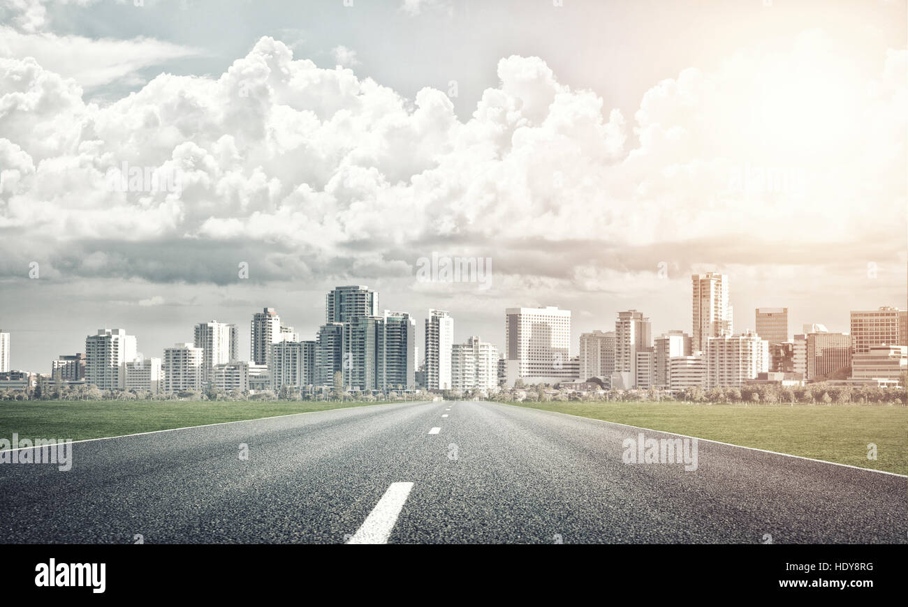 Road to big city Stock Photo - Alamy