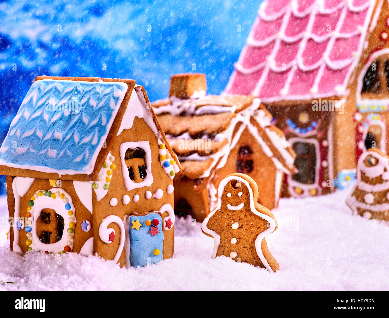 Gingerbread man and house near Christmas tree cookie Stock Photo - Alamy