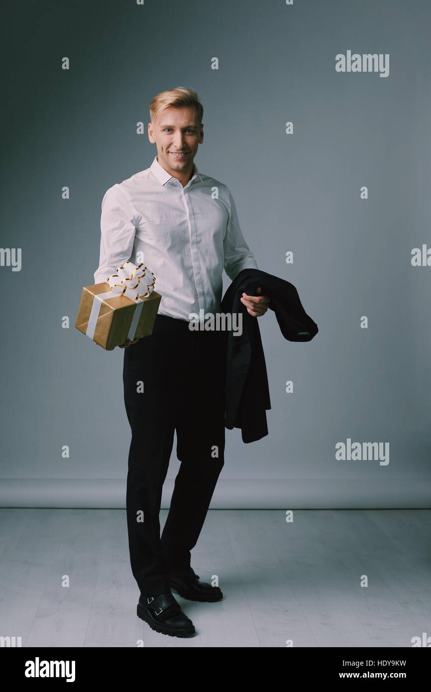 Handsome blond young man posing at studio Stock Photo - Alamy