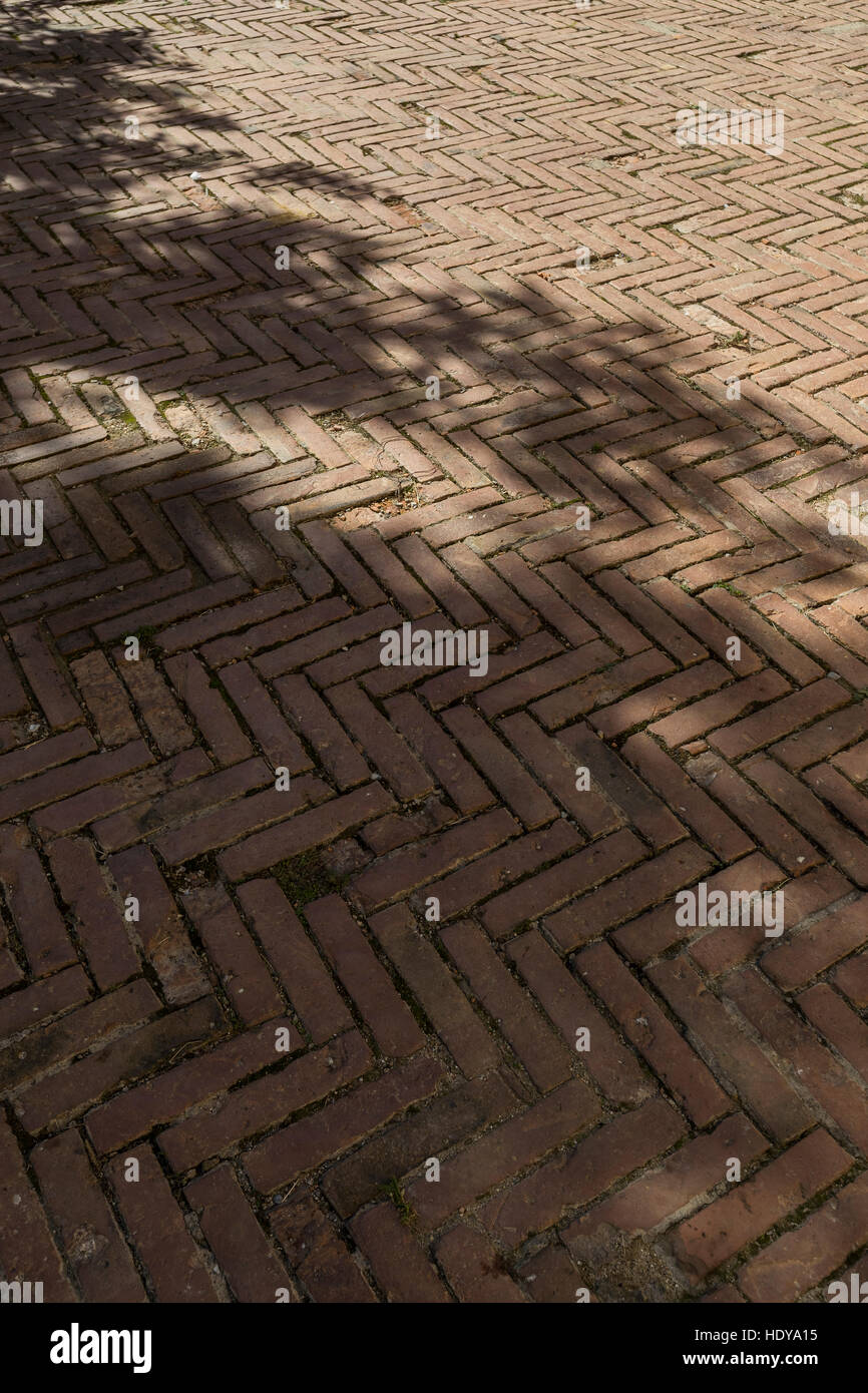 pavement herringbone. Medieval city of San Gimignano, Tuscany, Italy ...