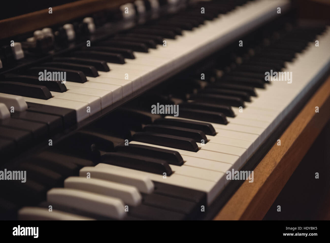 Close-up of piano keyboard in recording studio Stock Photo - Alamy