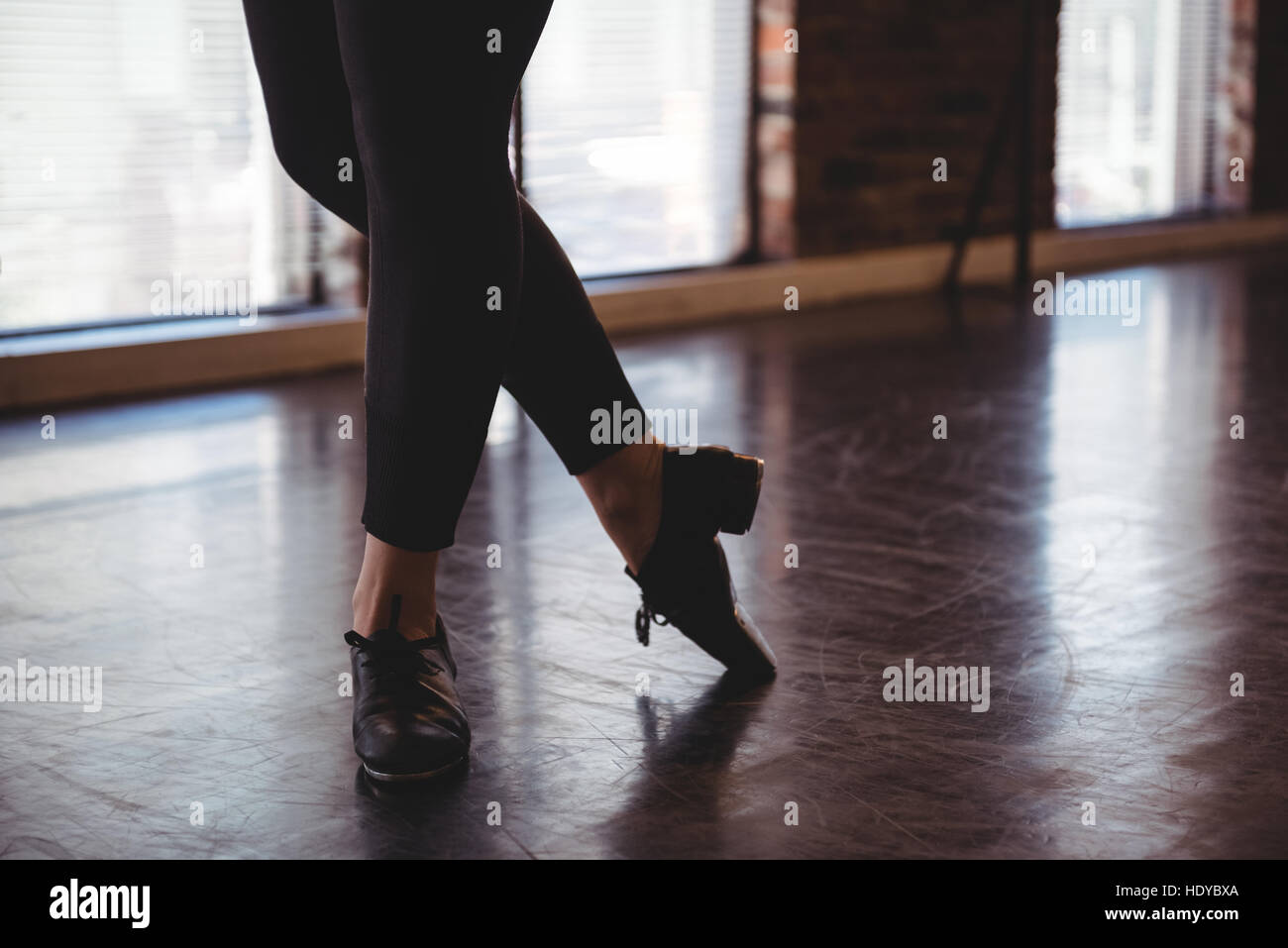 Feet of woman performing dance in ballet studio Stock Photo - Alamy