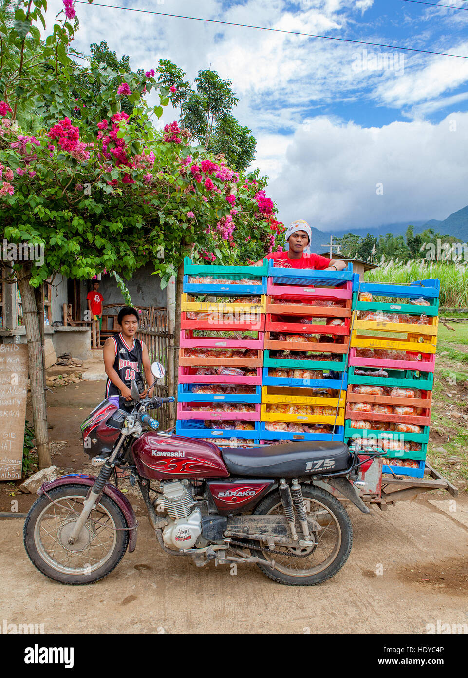 Colourful plastic bread boxes stacked on a motorcycle sidecar at Ma'ao ...