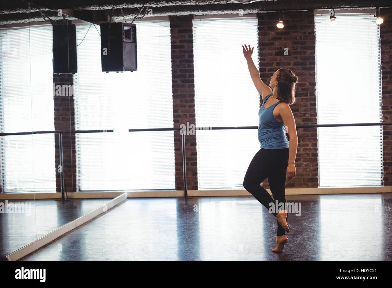 Woman practicing dance in dance studio Stock Photo - Alamy