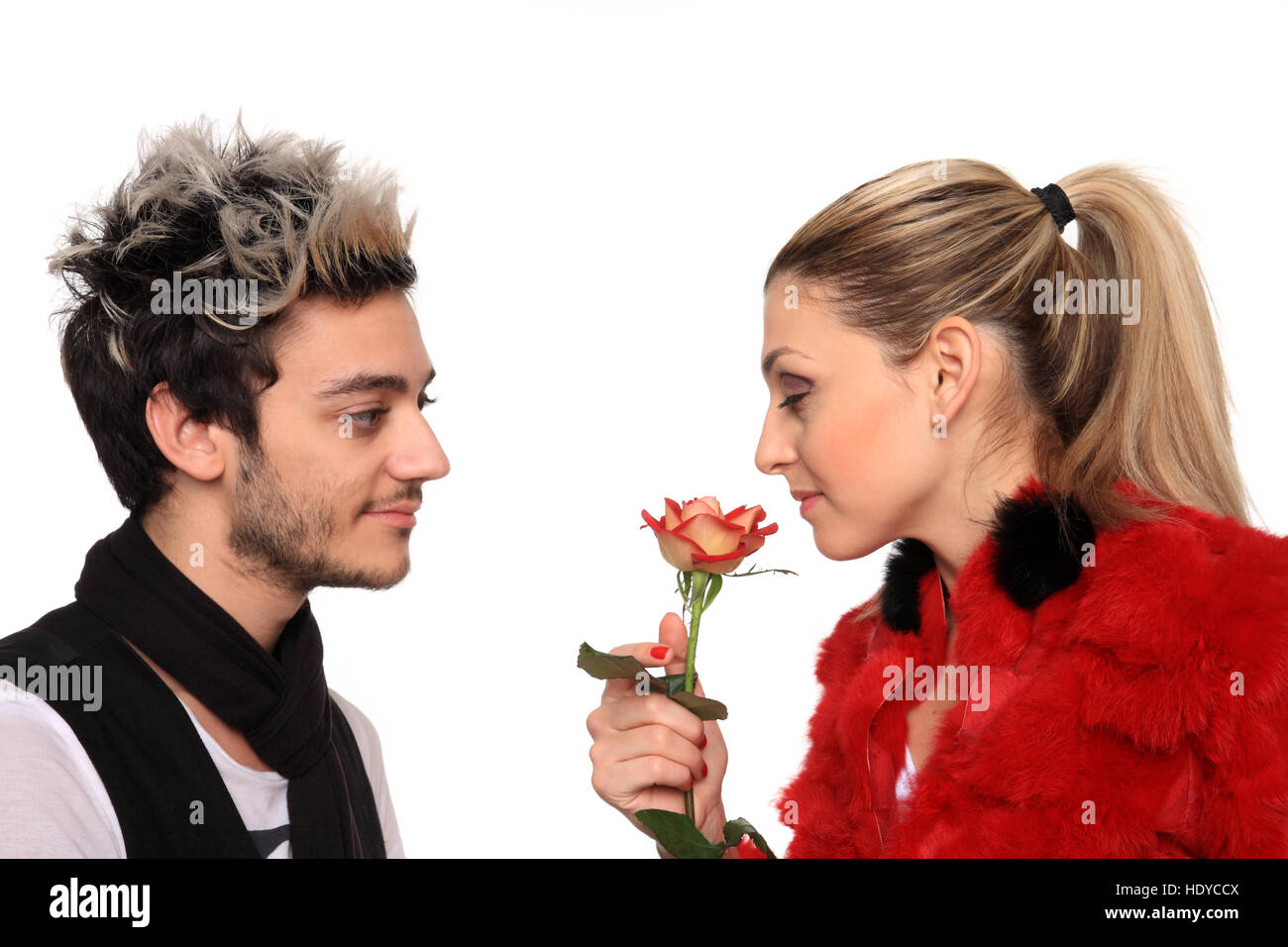 young man and girl with a rose isolated on a white background Stock ...