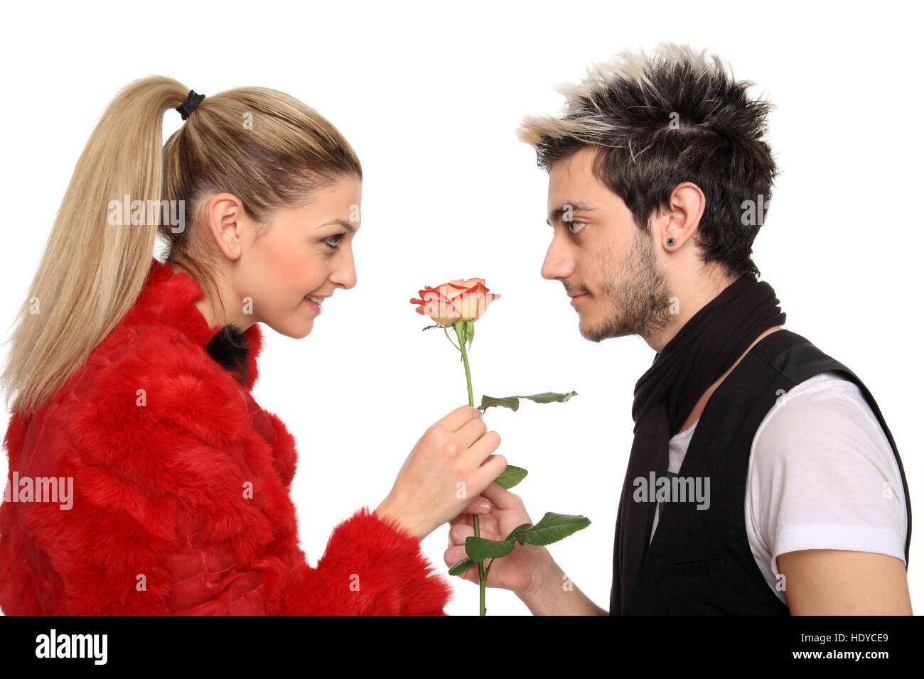 young man and girl with a rose isolated on a white background Stock ...