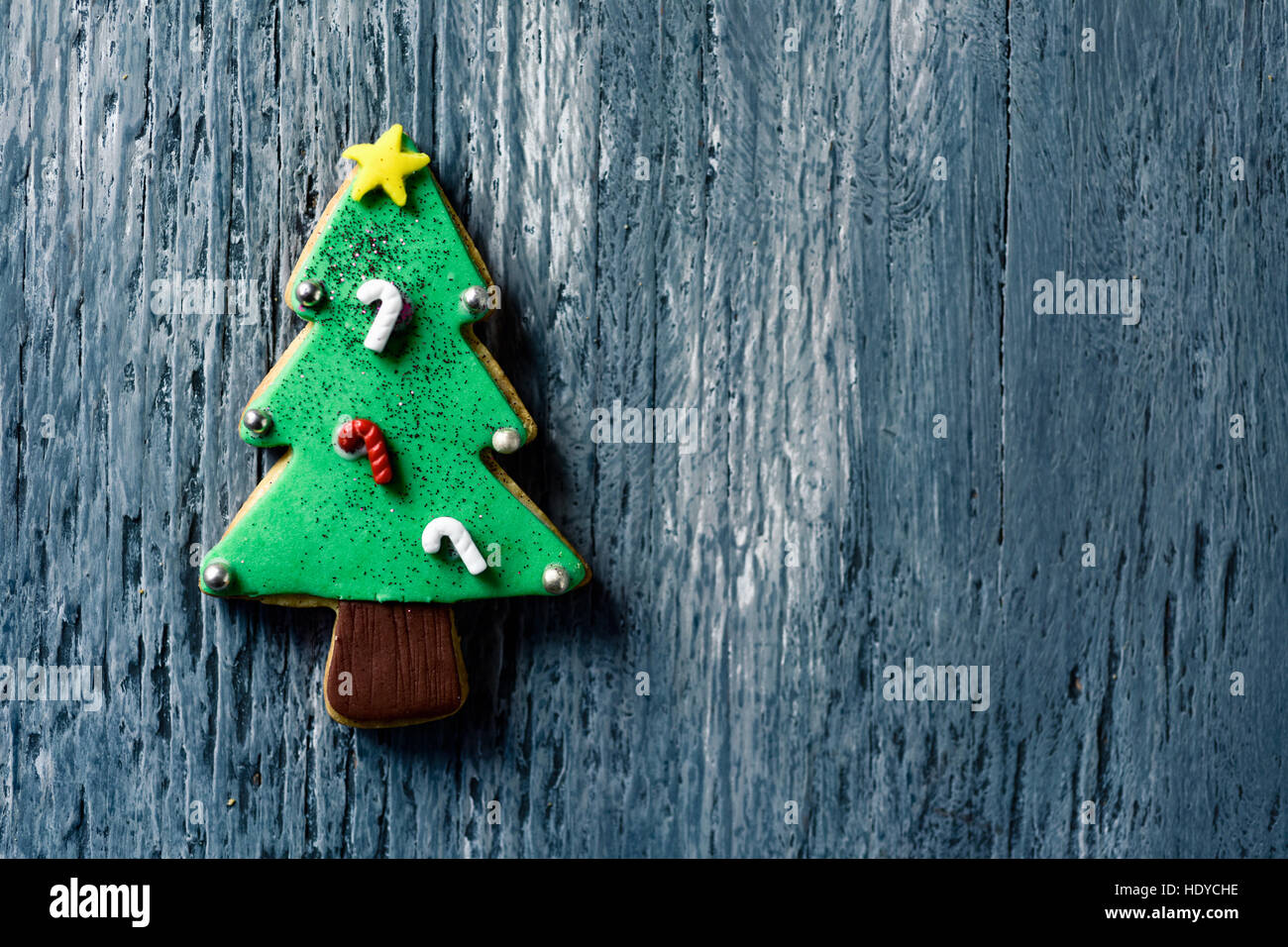high-angle shot of a christmas cookie in the shape of a christmas tree ...