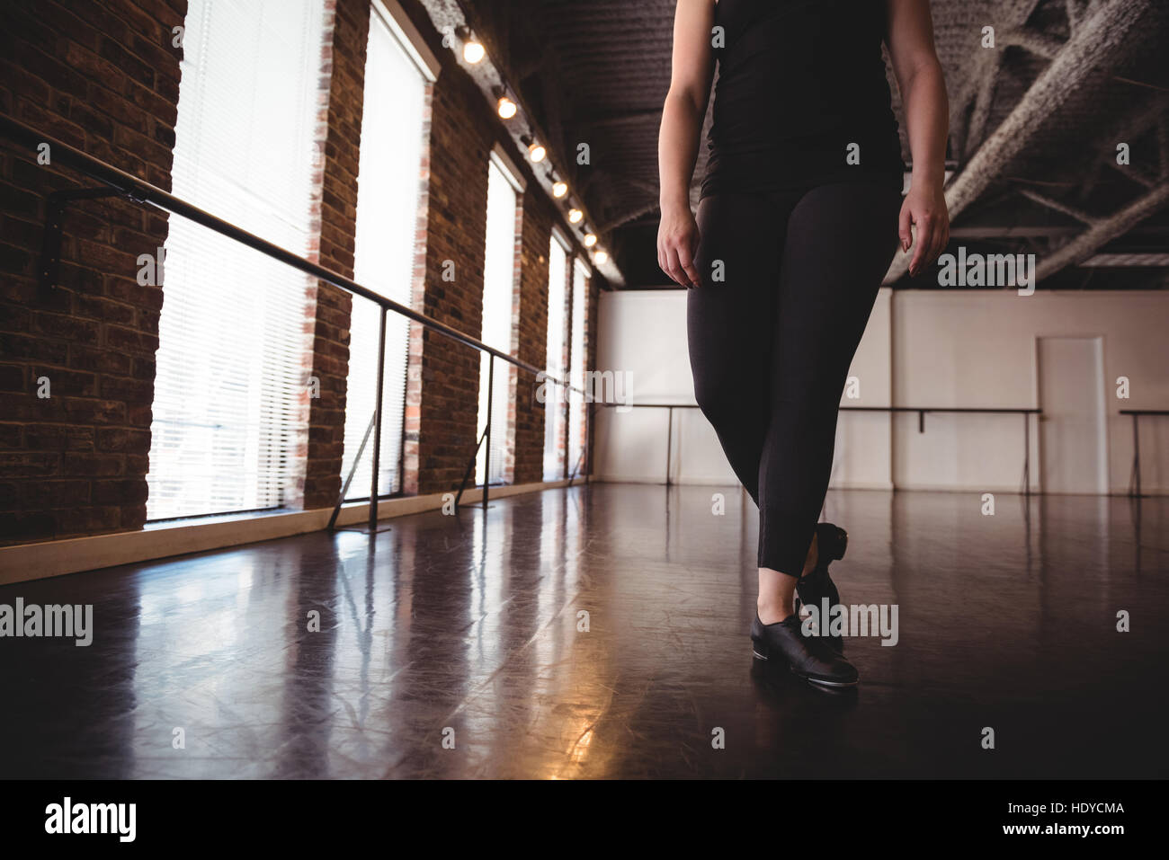 Feet of woman performing dance in ballet studio Stock Photo - Alamy