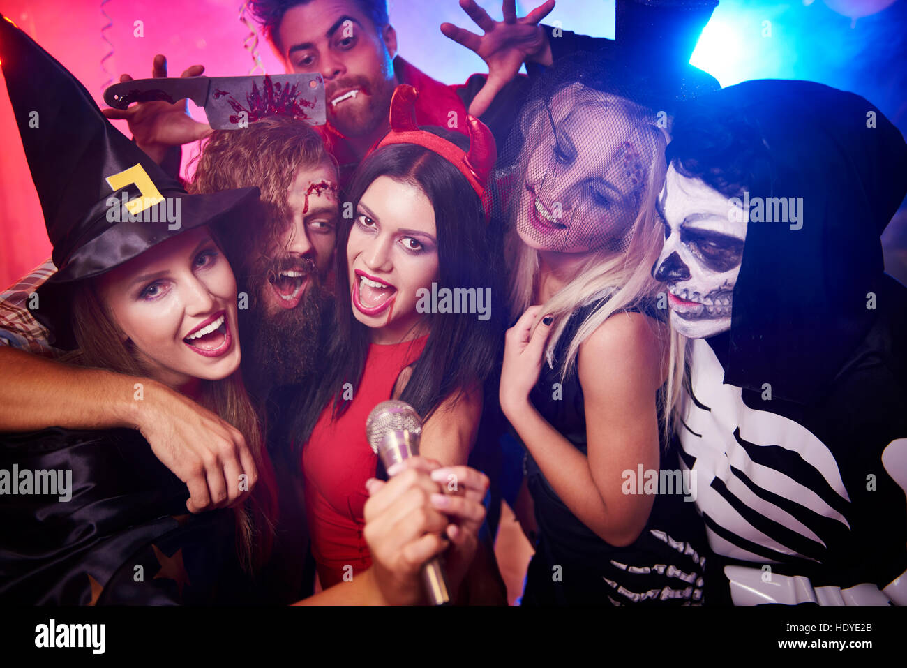 Friends singing their favorite song Stock Photo - Alamy