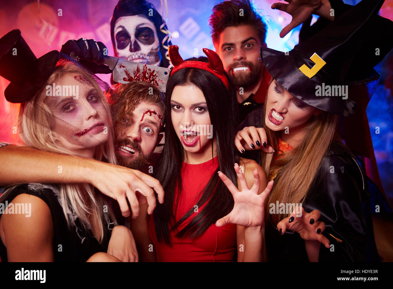 Group of creepy friends at the party Stock Photo - Alamy
