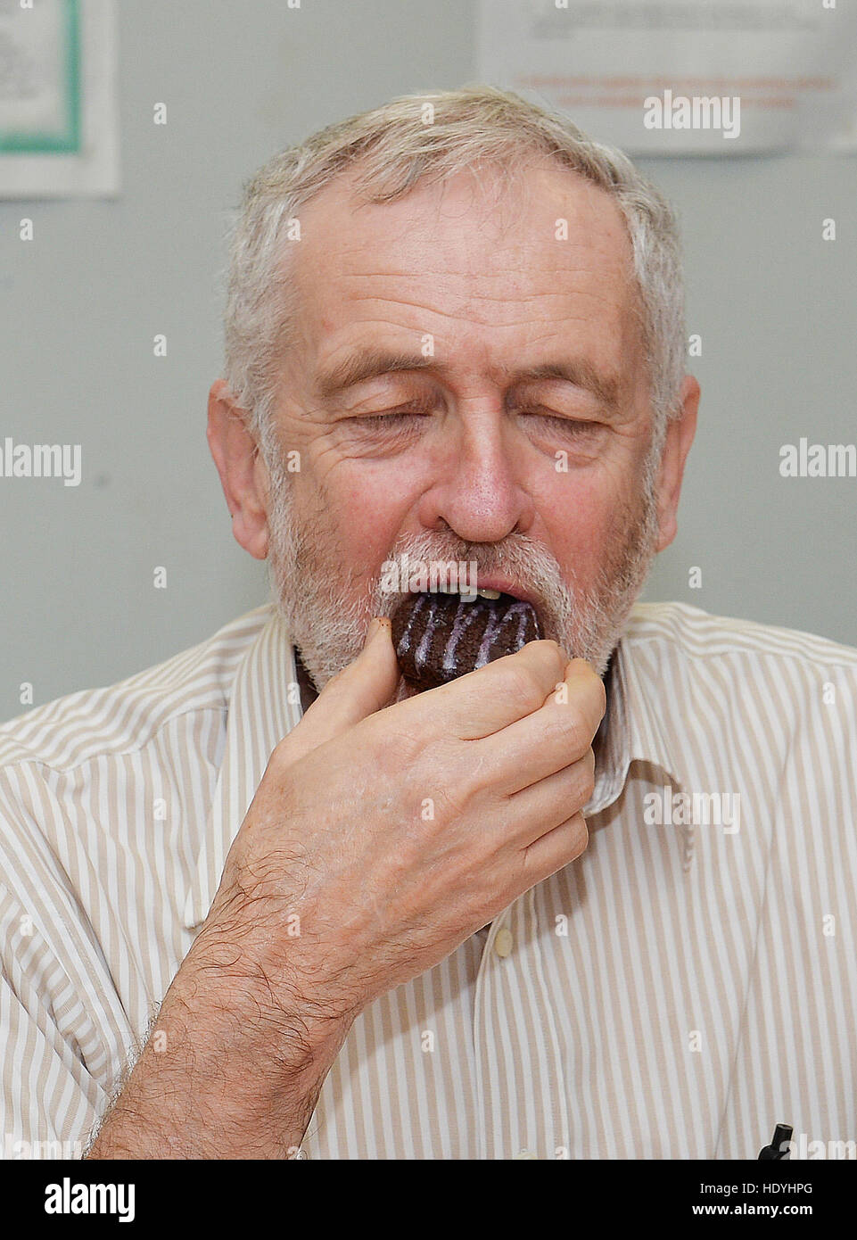 Labour leader Jeremy Corbyn, eats a chick-pea cake as he joins a class ...