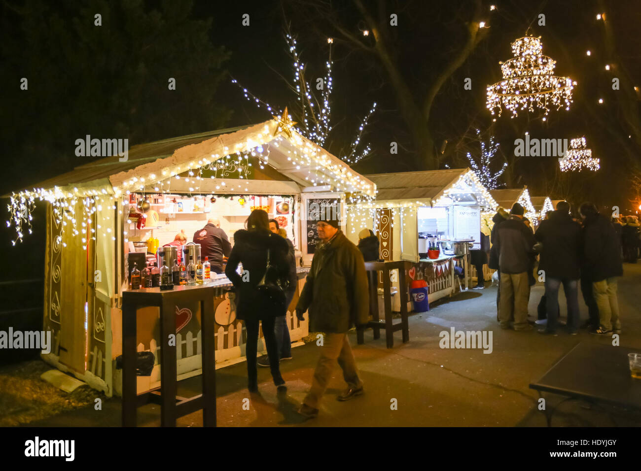 People sightseeing the food and souvenir stands at Stross promenade in ...