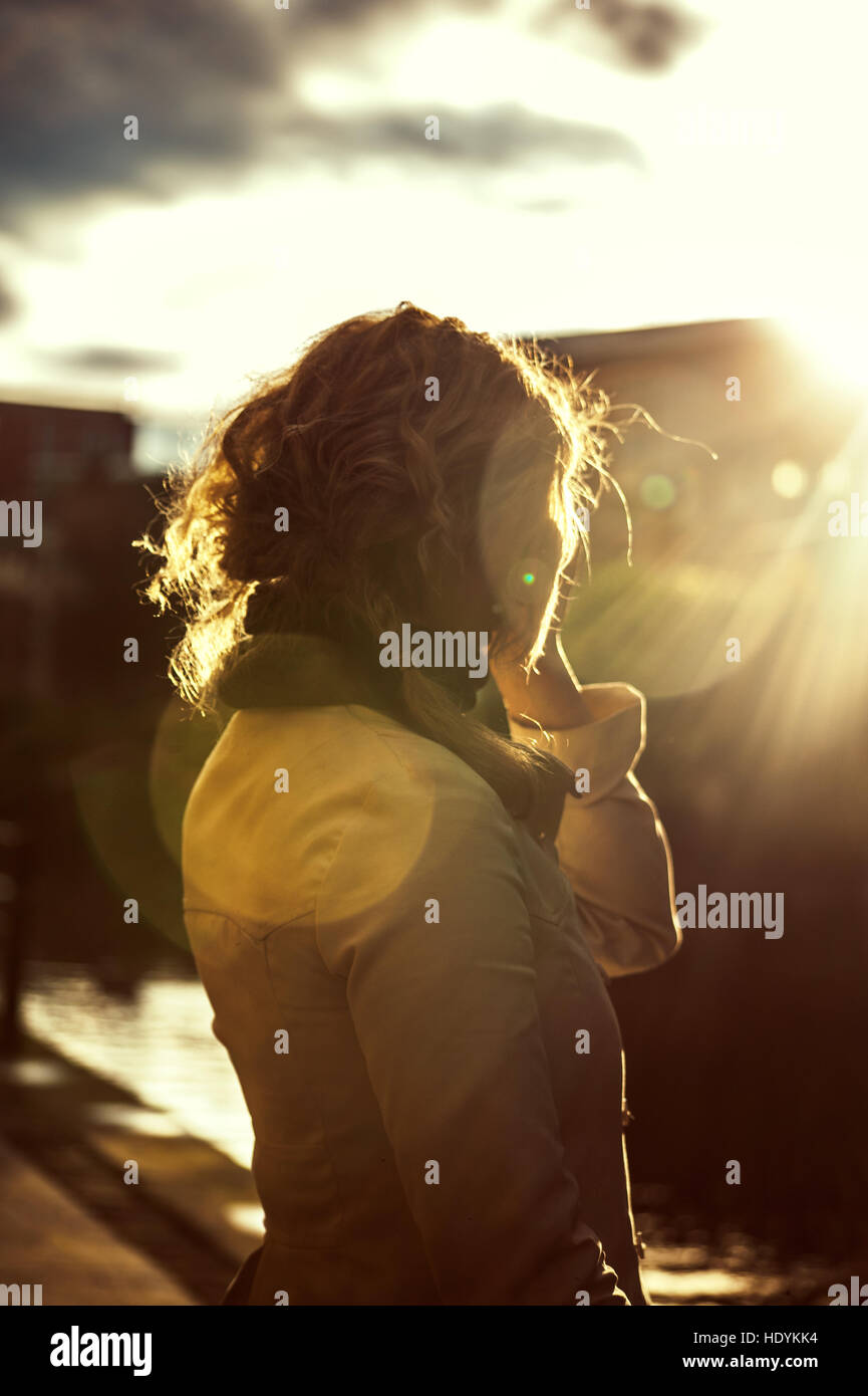 Woman walking in town hi-res stock photography and images - Alamy