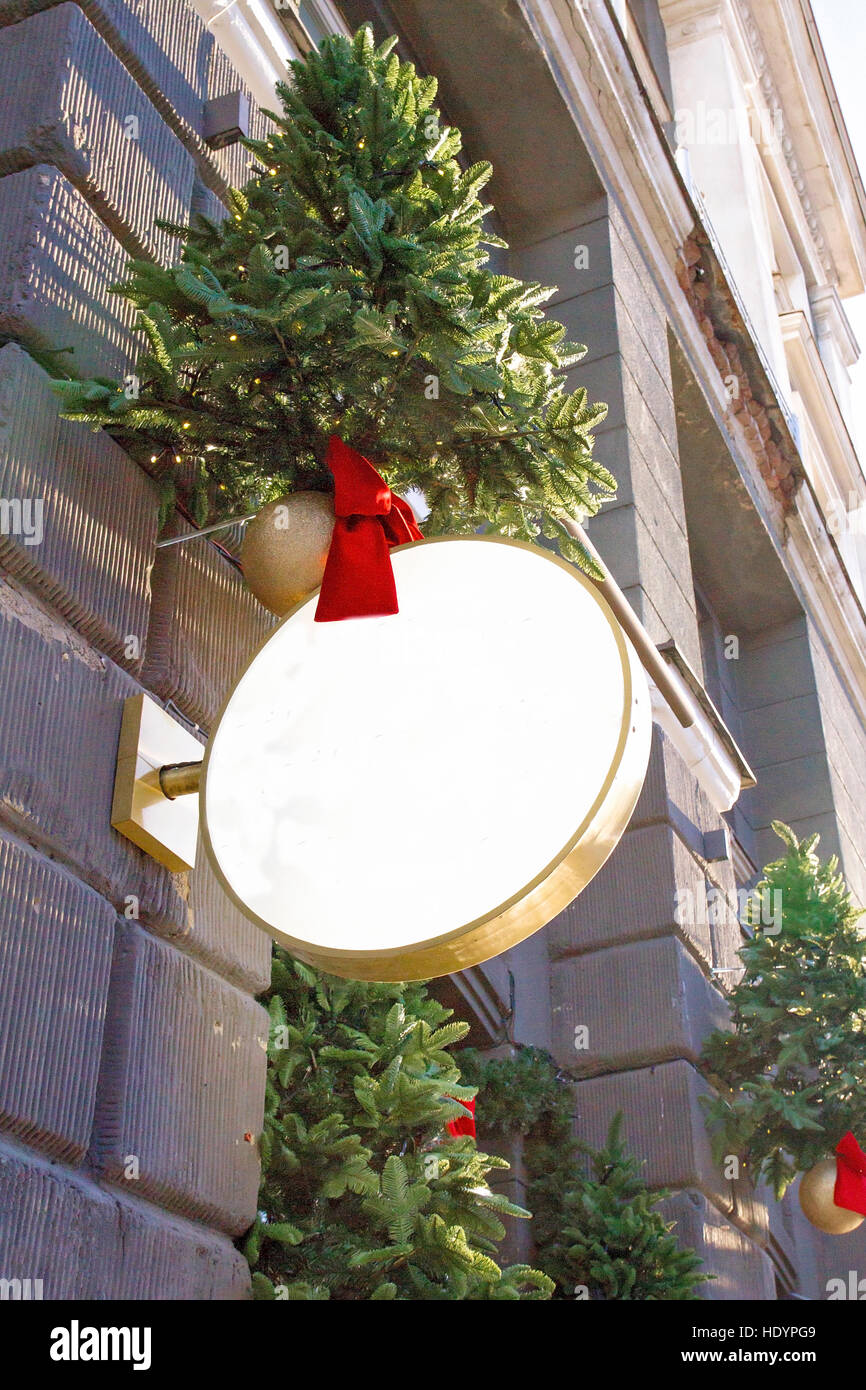 Signboard with Christmas decorations. Mock up. Round shape Stock Photo ...