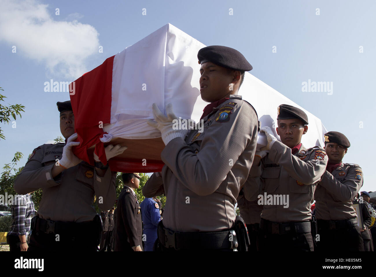 Batam, Riau Island, Indonesia. 16th Dec, 2016. Police officers carry ...