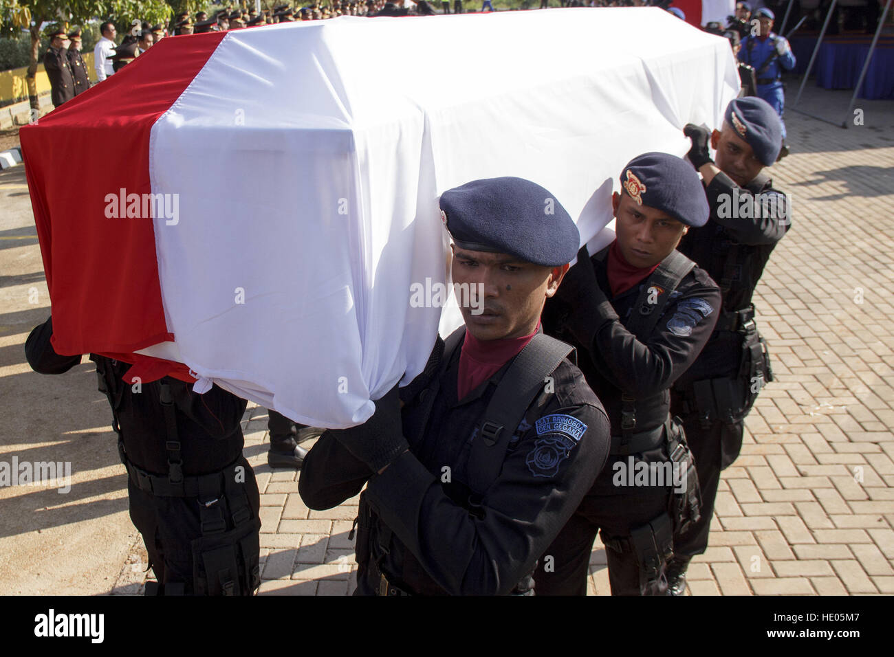 Batam, Riau Island, Indonesia. 16th Dec, 2016. Police officers carry ...