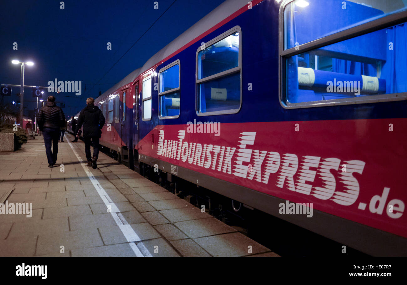Hamburg, Germany. 16th Dec, 2016. Passengers board a motorail train at ...