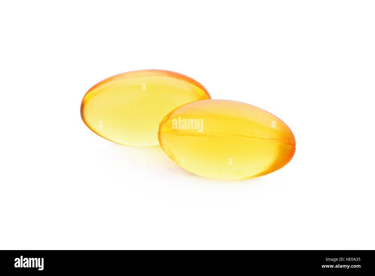 Fish oil pill isolated on white Stock Photo - Alamy