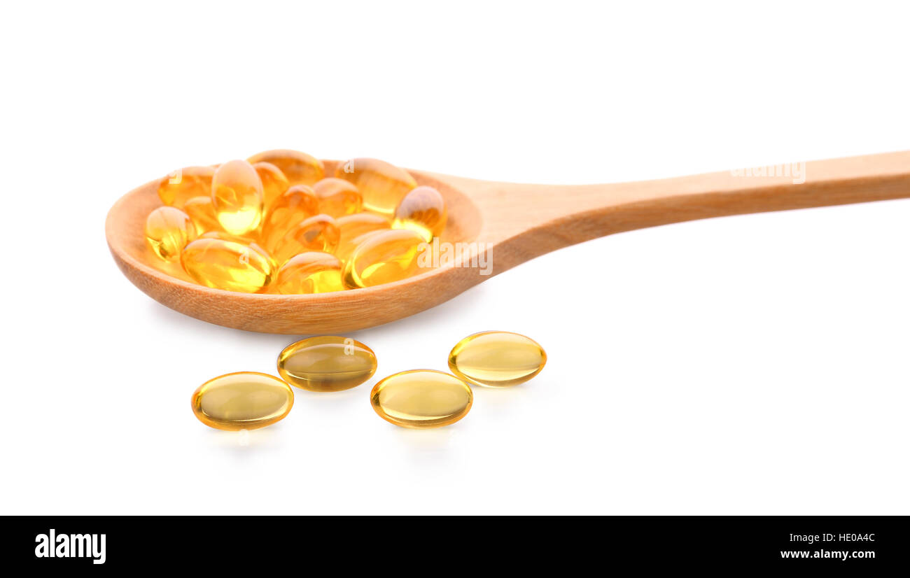 Fish oil on spoon Cut Out Stock Images & Pictures - Alamy