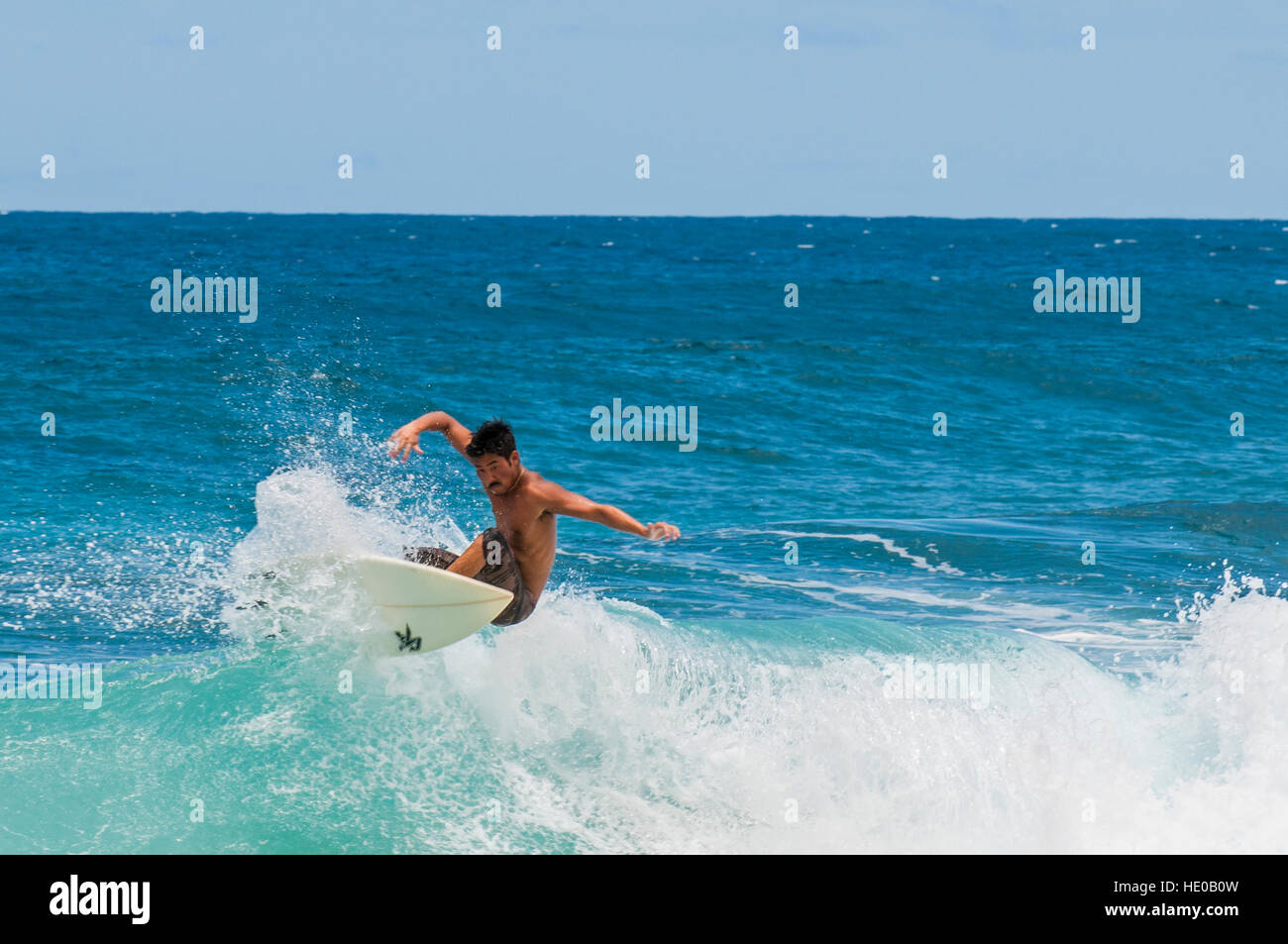 Surfing at Sunset Beach, North Shore, Oahu, Hawaii Stock Photo - Alamy