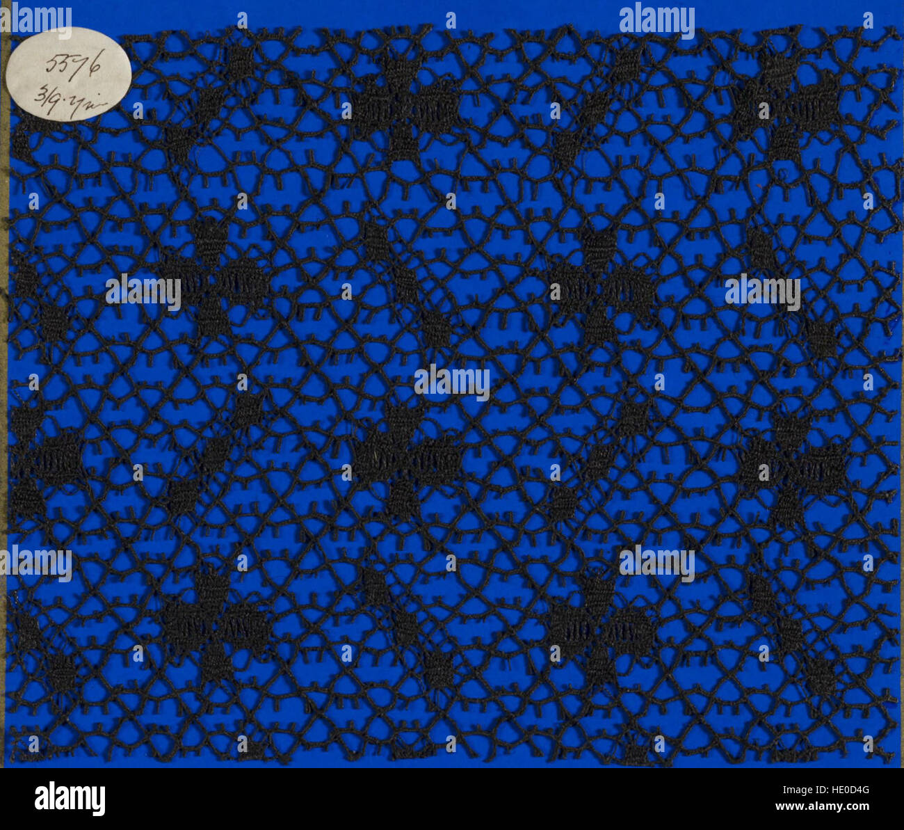 This 1900 lace sample book showcases a variety of lace patterns and ...