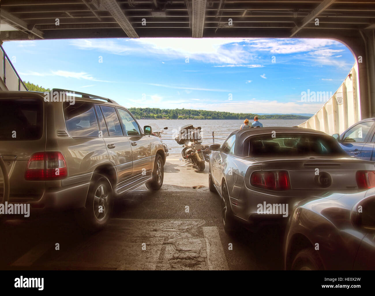 Passenger and vehicle ferry crossing Lake Champlain with unrecognizable ...