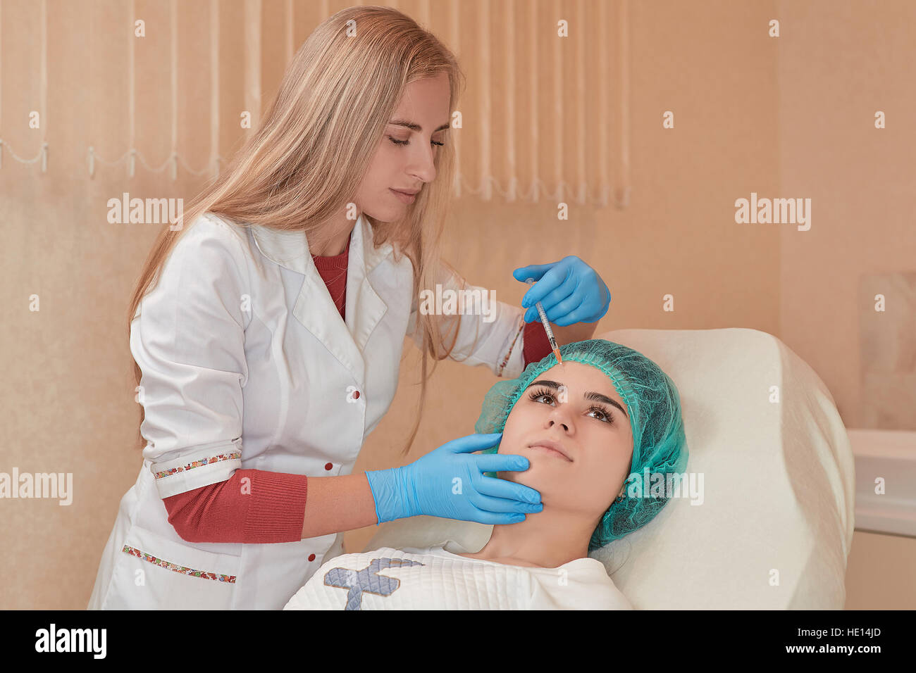 Beautiful woman gets injections Stock Photo - Alamy