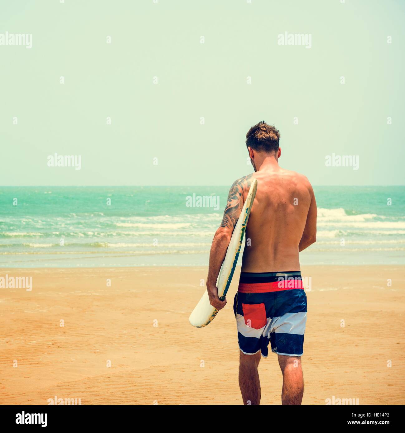 Man Beach Summer Holiday Vacation Surfing Concept Stock Photo - Alamy