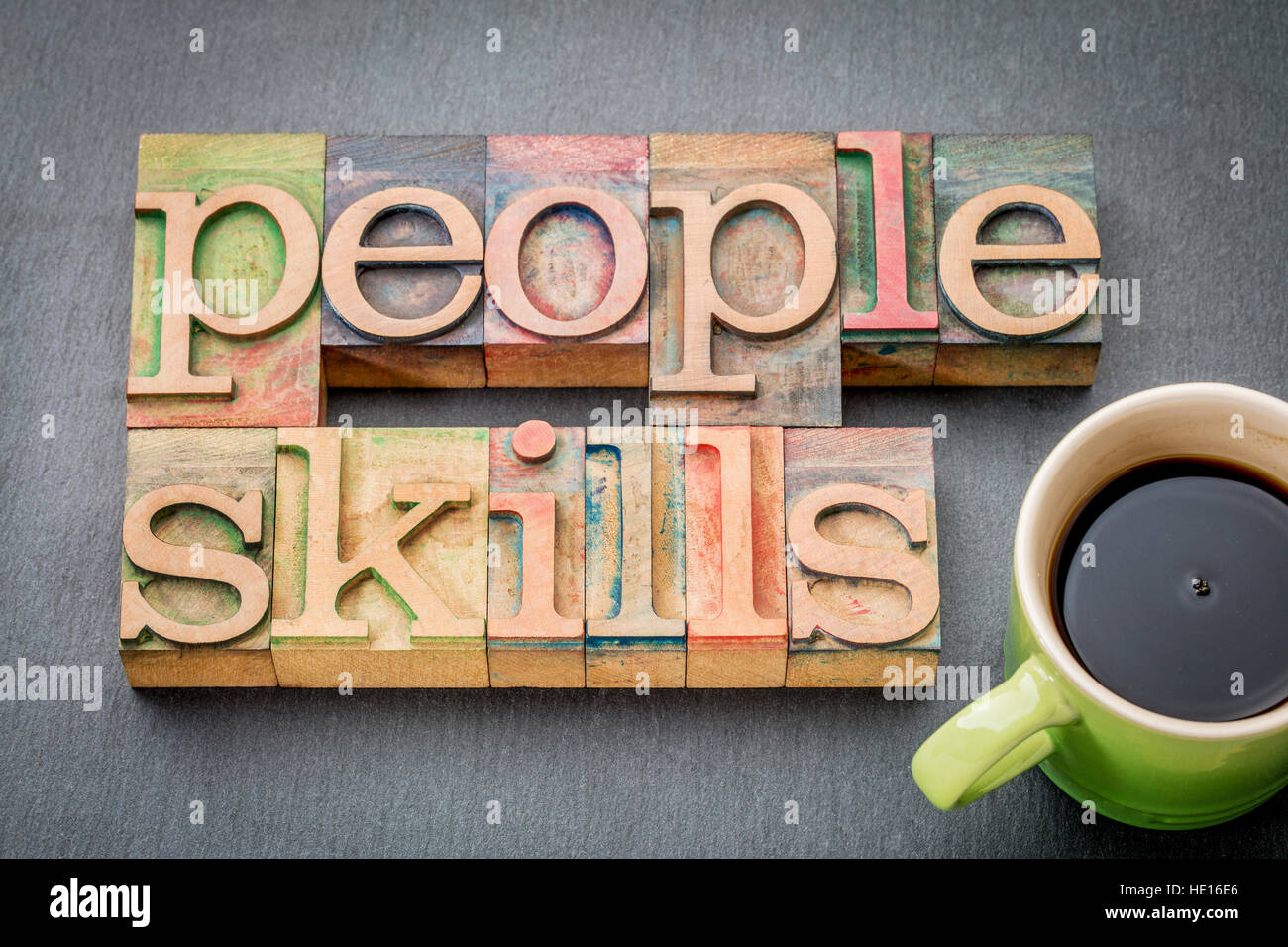 people skills word abstract in letterpress wood type with a cup of ...