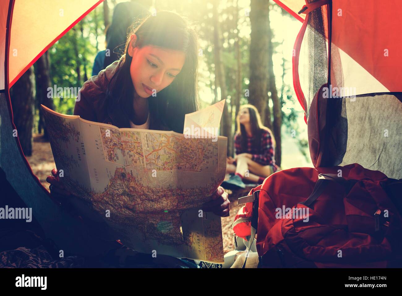 Girl Reading Map Traveling Destination Camping Concept Stock Photo - Alamy