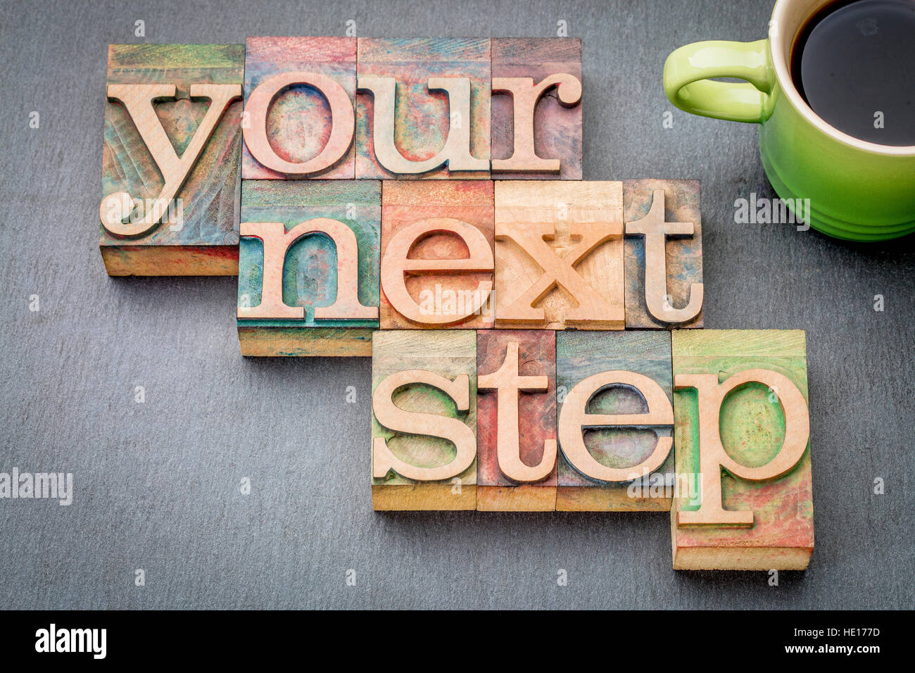 your next step word abstract in wooden letterpress printing blocks with ...