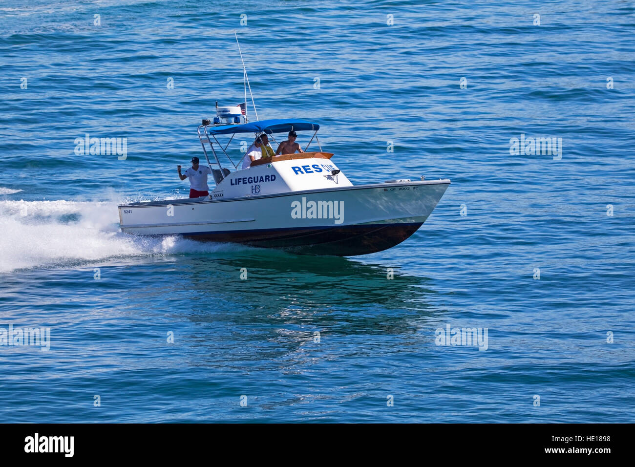 Beach life guard rescue using a rescue boat along California Pacific ...