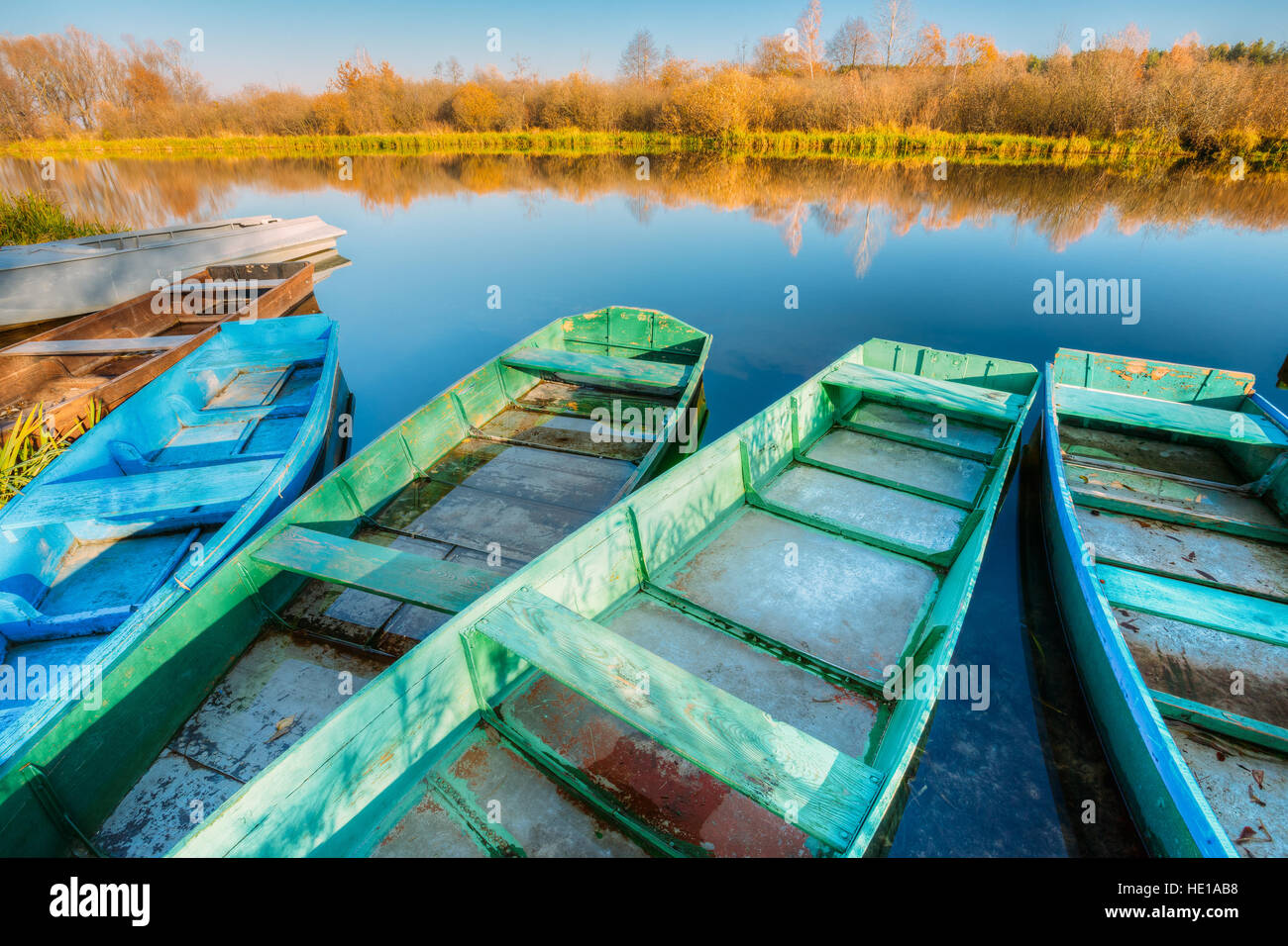 Close View Of The Tied Up Old Wooden Fishing Rowboats Skippets Afloat ...