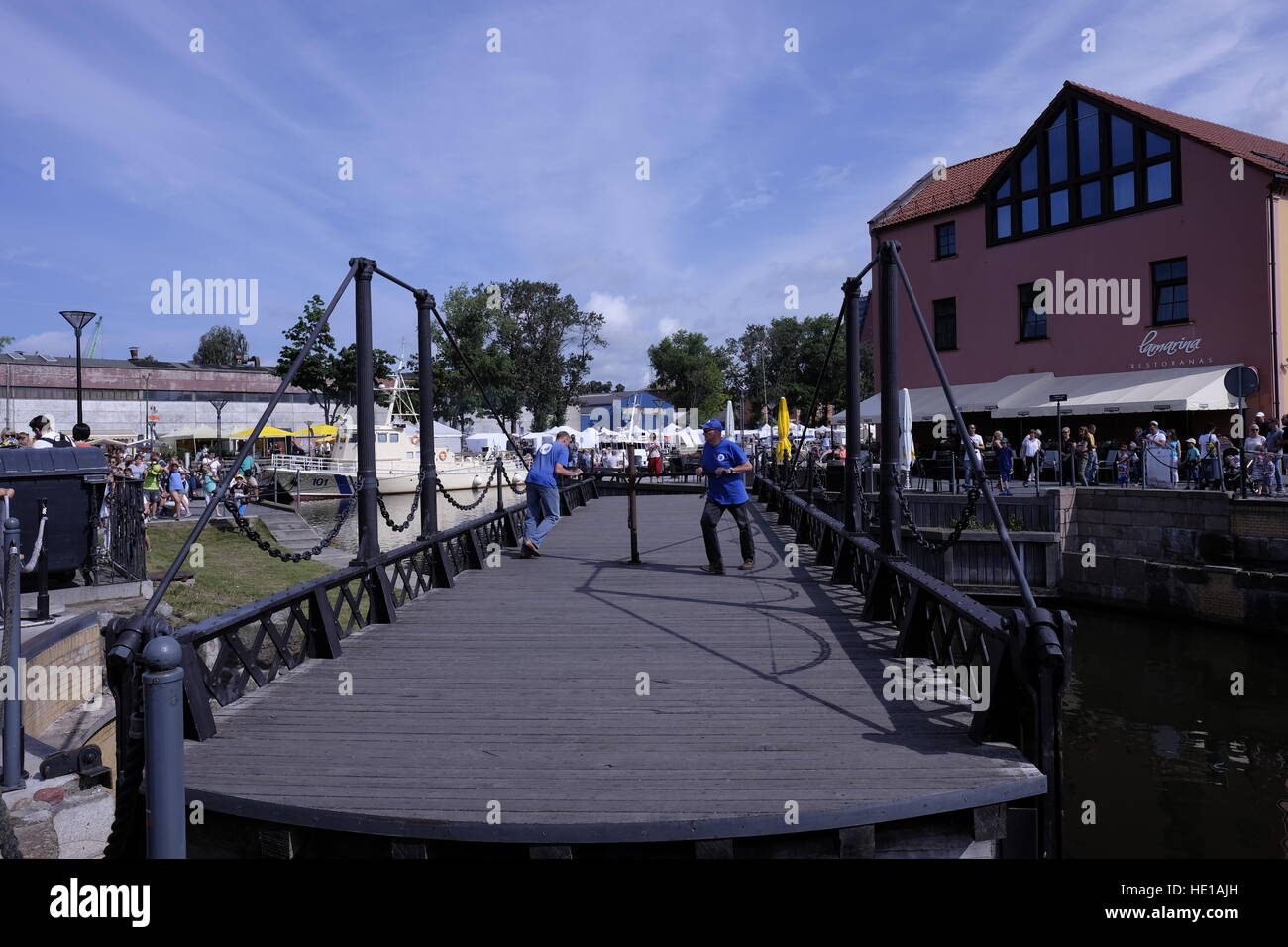 Movable foot bridge turned by port workers to let the occasional boat ...