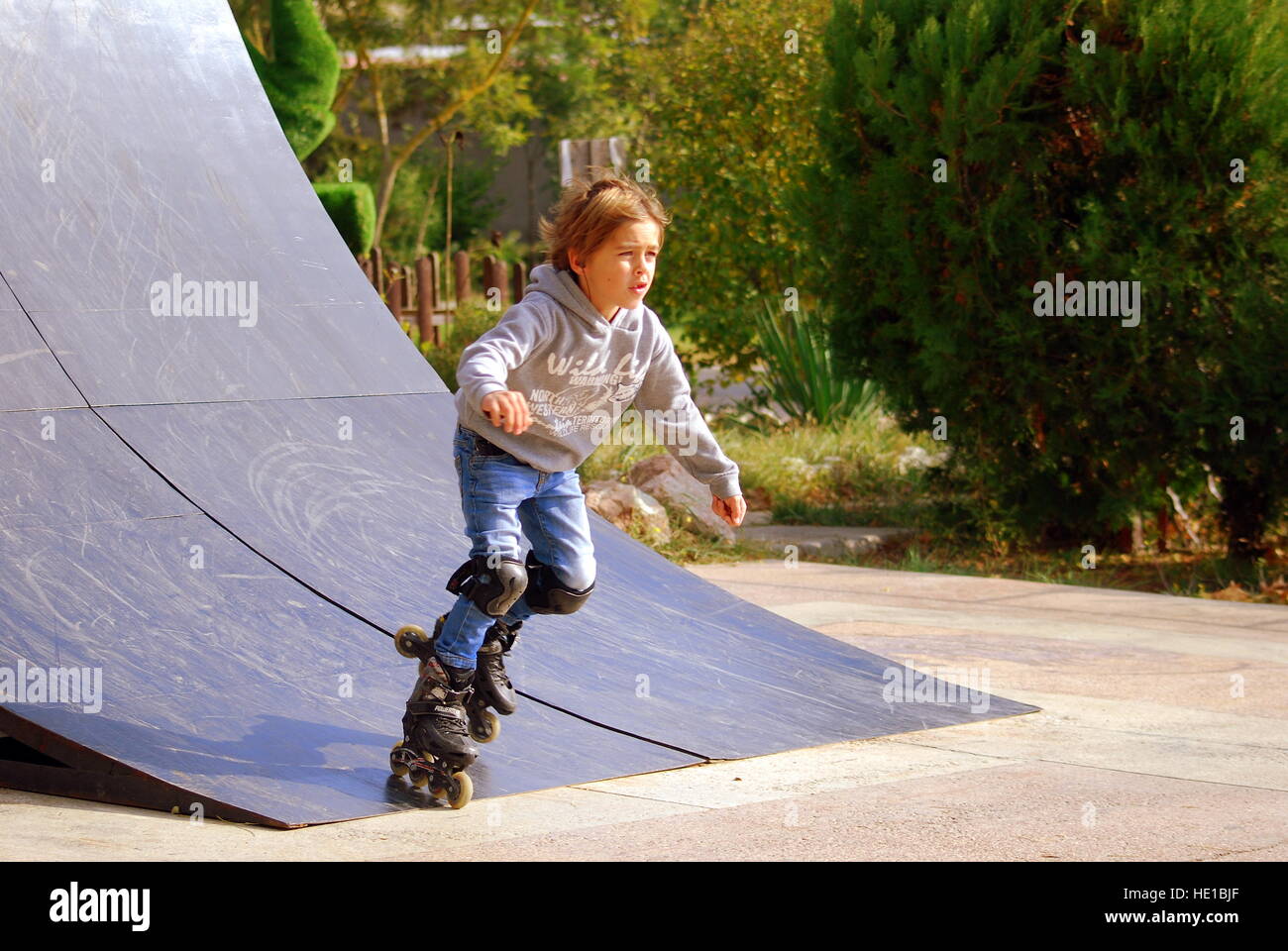 The ride on the rollers. Training for riding on roller skates Stock ...