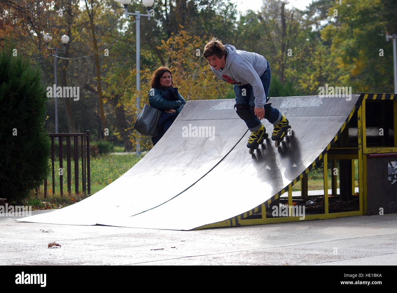The ride on the rollers. Training for riding on roller skates Stock ...
