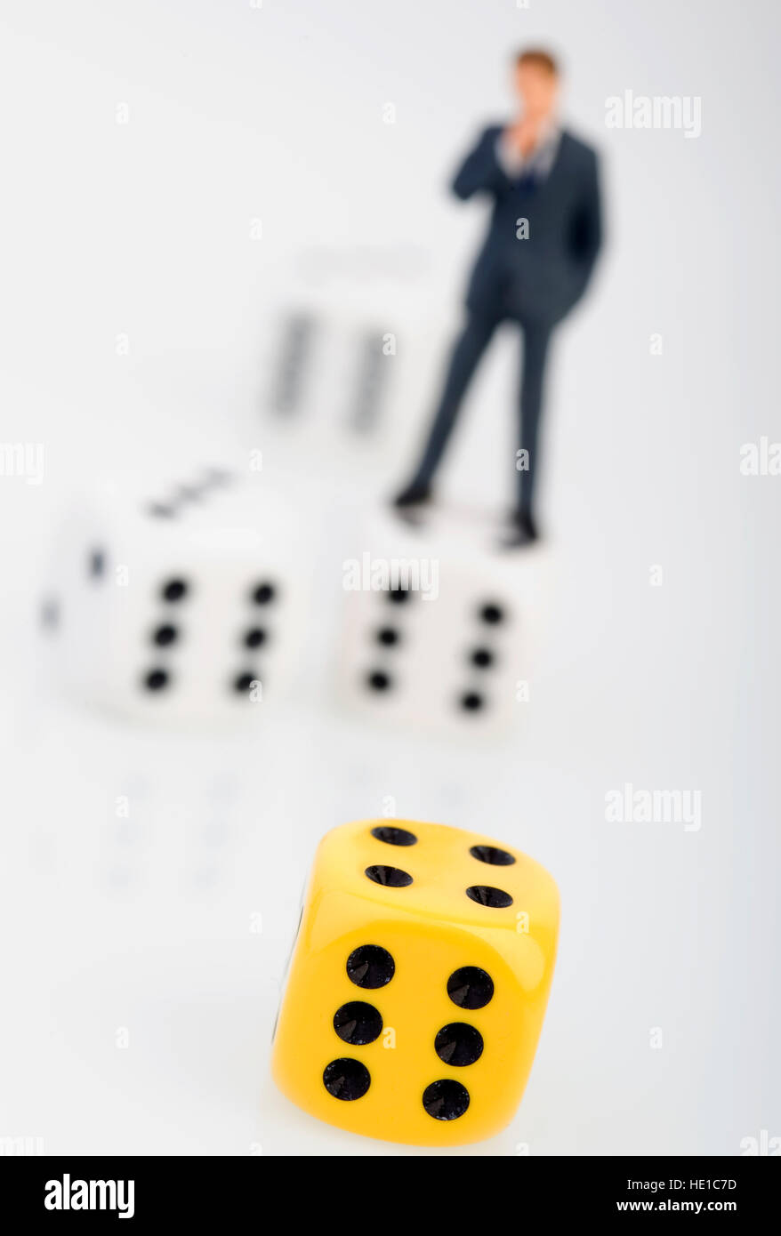Businessman and dice Stock Photo - Alamy