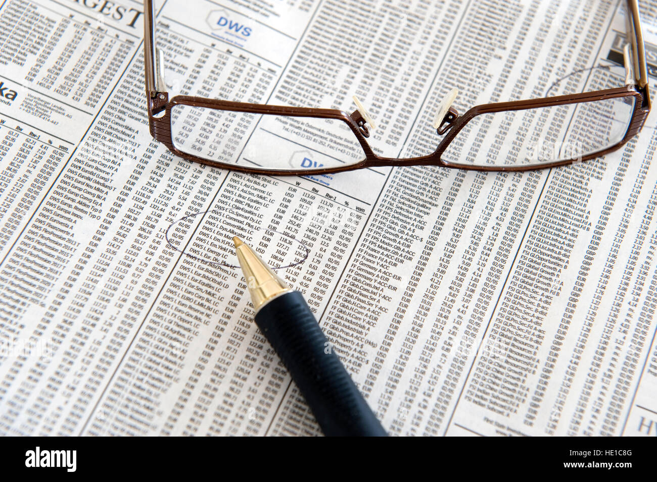 Reading open newspaper financial hi-res stock photography and images ...