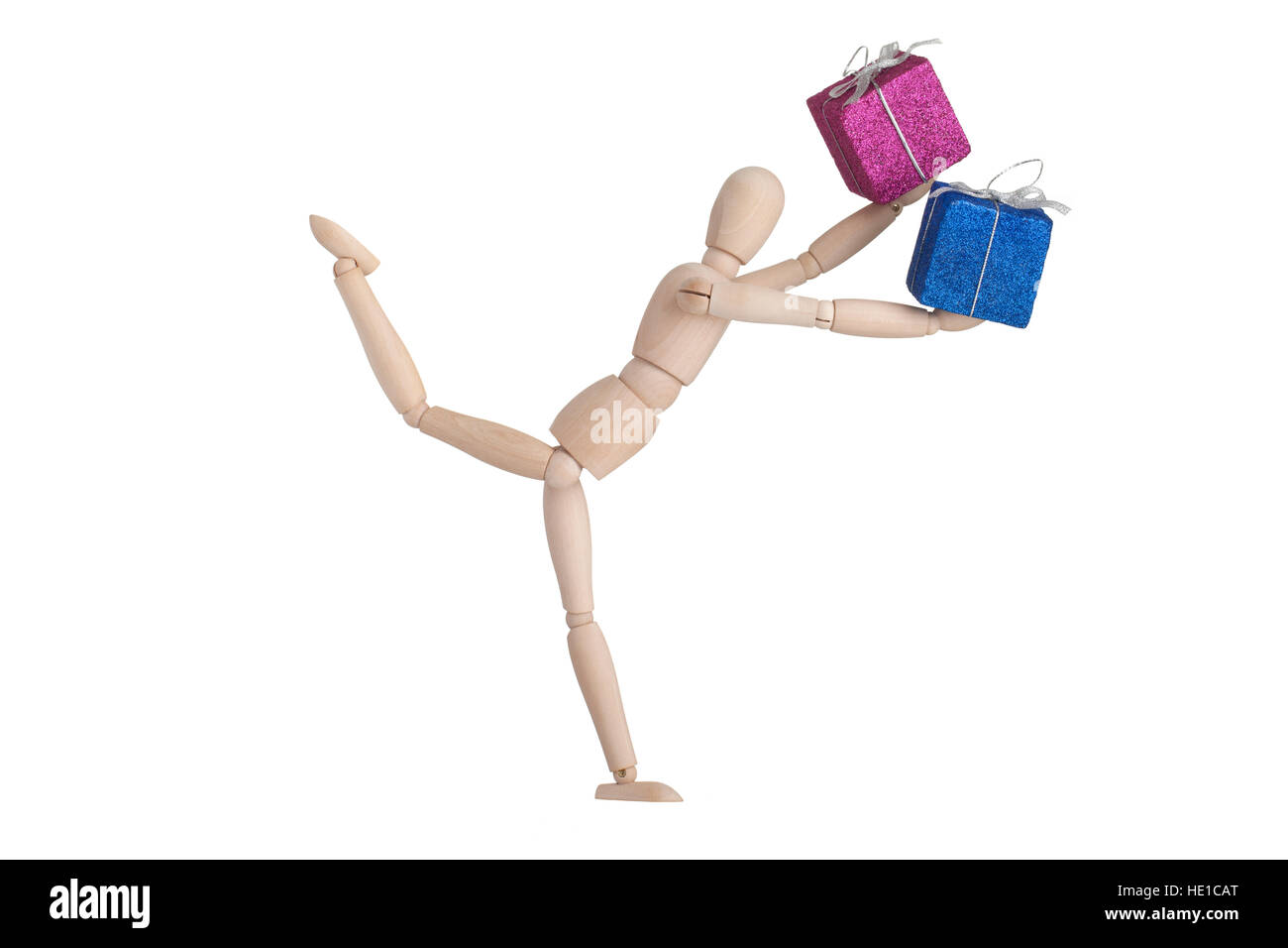 Wooden mannequin with gifts Stock Photo - Alamy